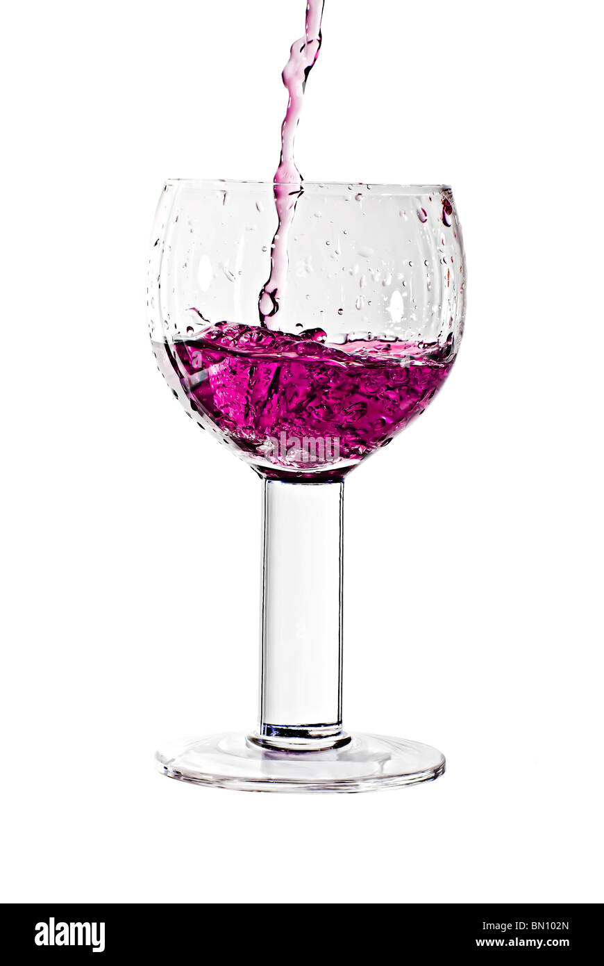 Splash in a glass. A fresh cold drink. Colorful drink Stock Photo - Alamy