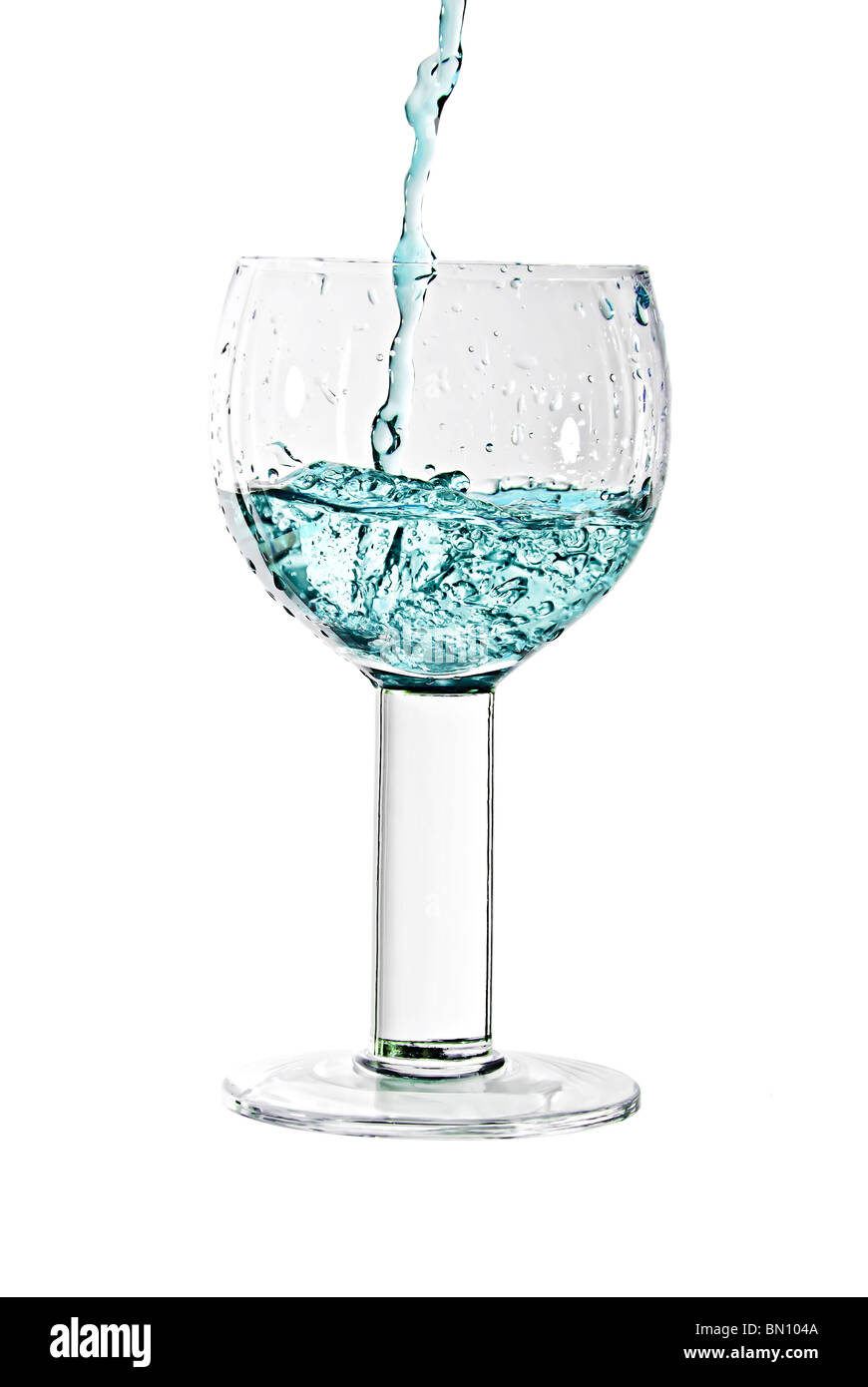 Splash in a glass. A fresh cold drink. Colorful drink Stock Photo - Alamy