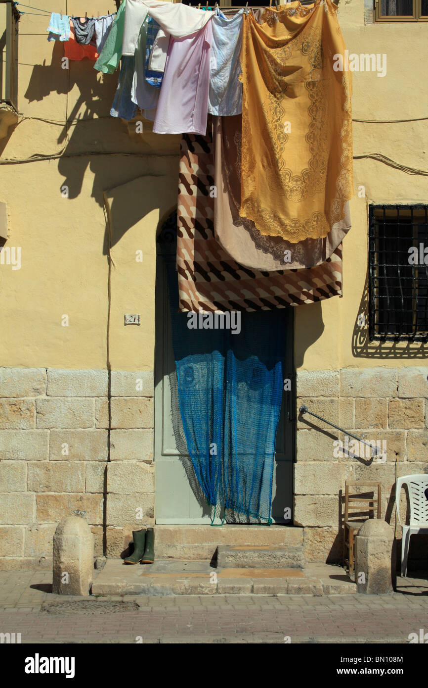 The doorway to a house, the front door, with lines of multi colored ...