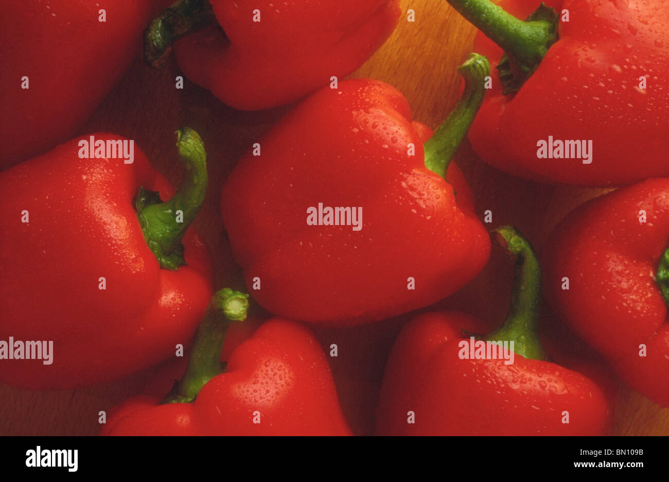 fresh grown red peppers still life Stock Photo - Alamy