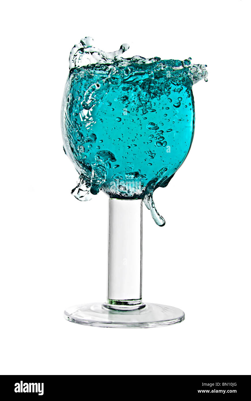 Splash in a glass. A fresh cold drink. Colorful drink Stock Photo - Alamy