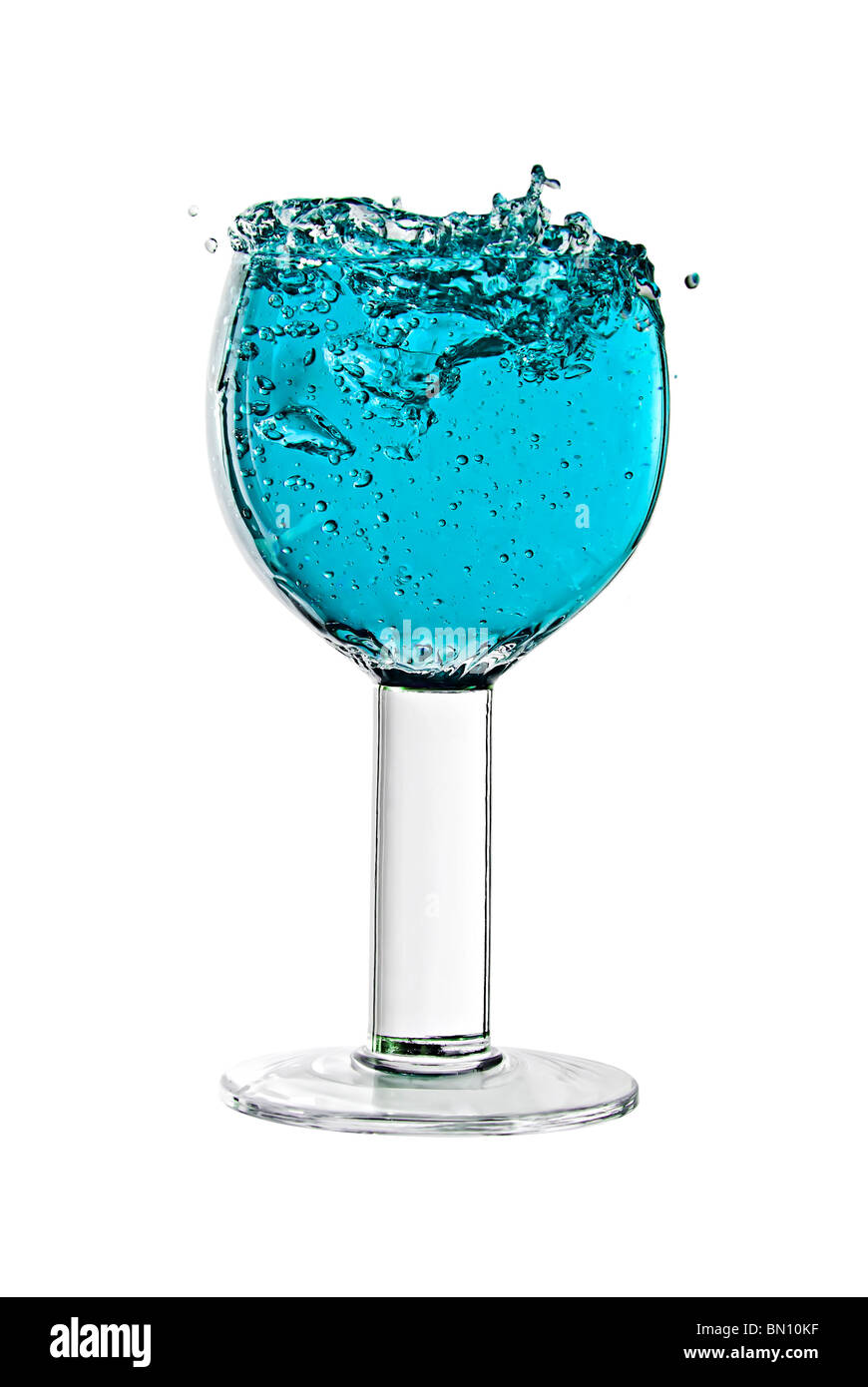 Splash in a glass. A fresh cold drink. Colorful drink Stock Photo - Alamy