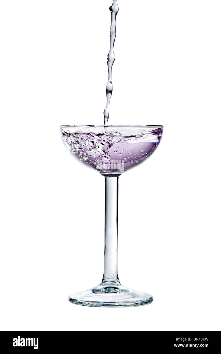 Splash in a glass. A fresh cold drink. Colorful drink Stock Photo - Alamy