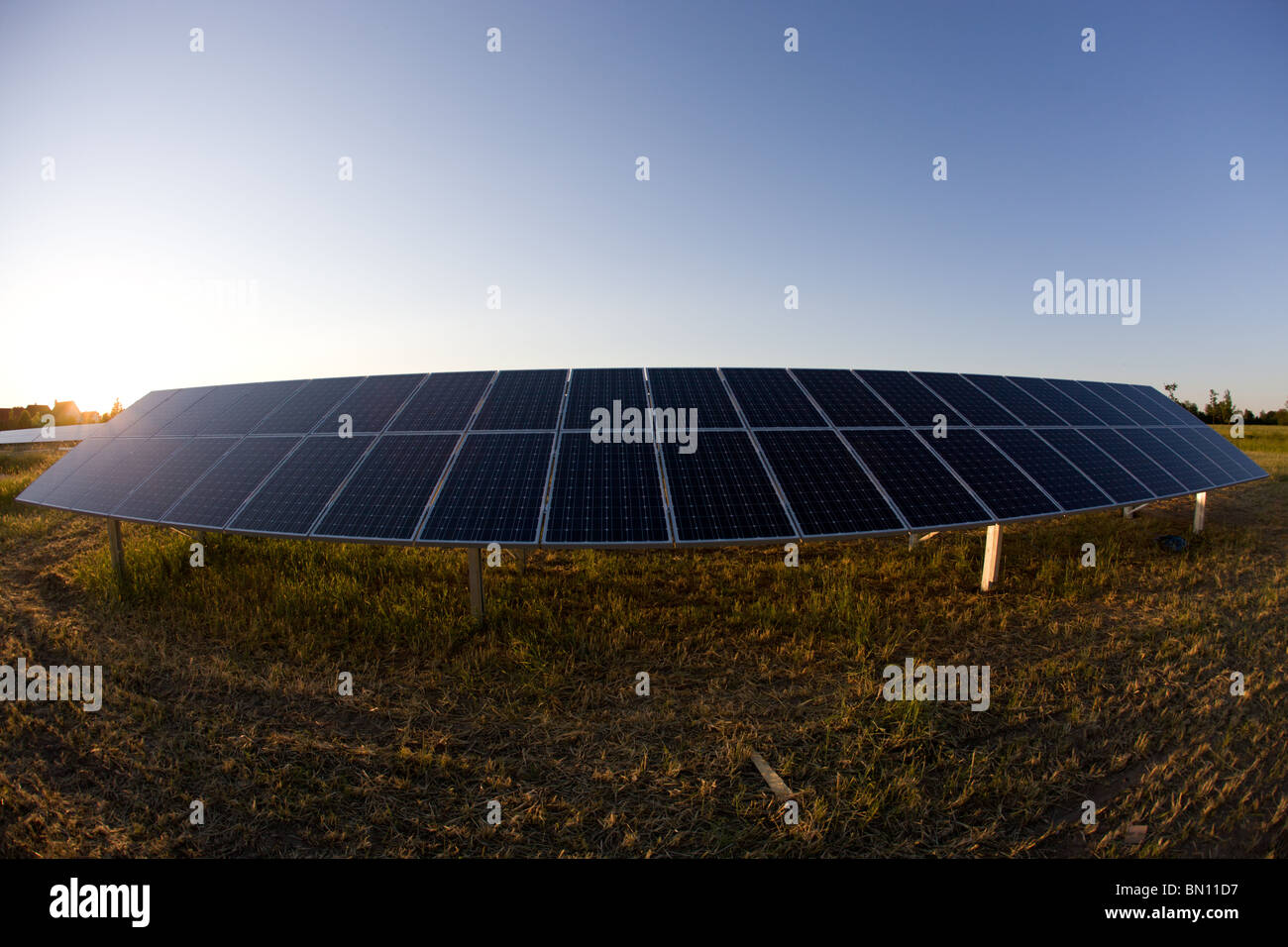 Solar modules in a solar farm in Germany - image taken through a ...