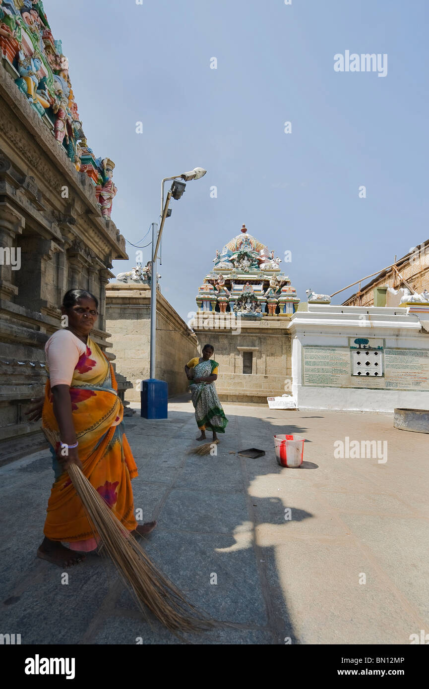 India Tamil Nadu Chennai women sweeping out a court of the Kapaleshvara ...