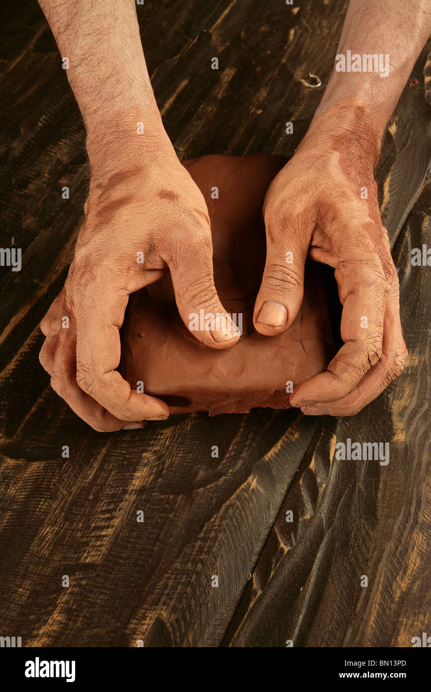 artist man hands working red clay to create handcraft art Stock Photo ...