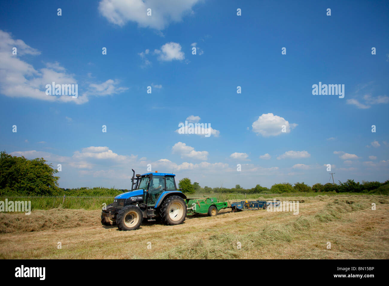 making hay bales Stock Photo - Alamy