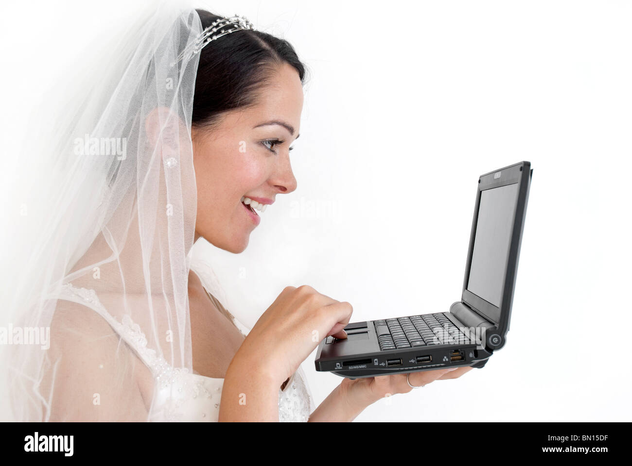Bride using a laptop Stock Photo - Alamy
