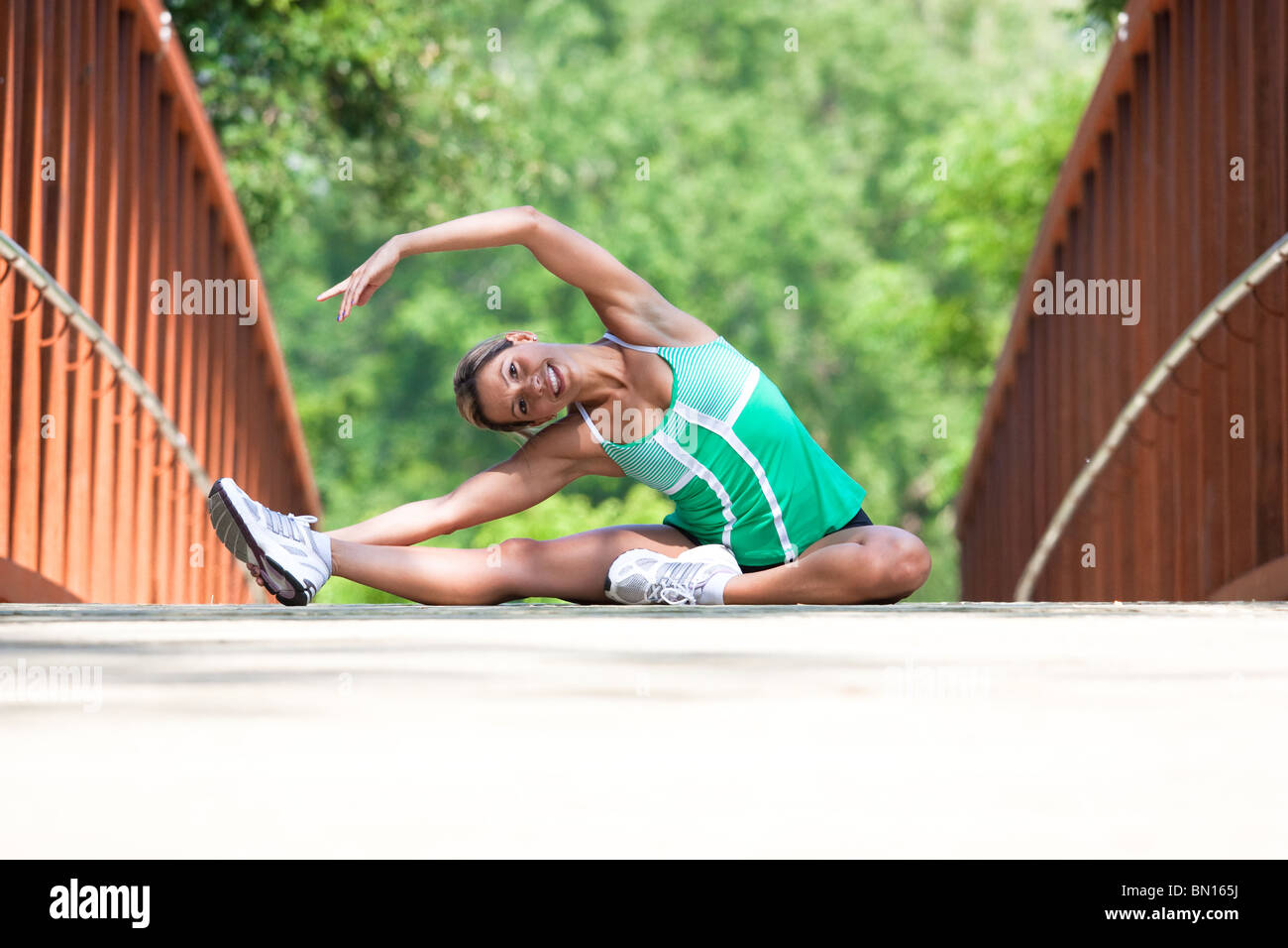 young female hamstring stretch outdoor Stock Photo - Alamy