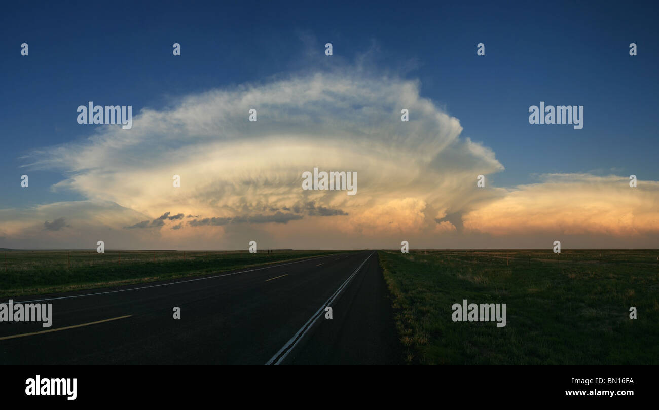 storm cell anvil head clouds above the great plains horizon just before ...