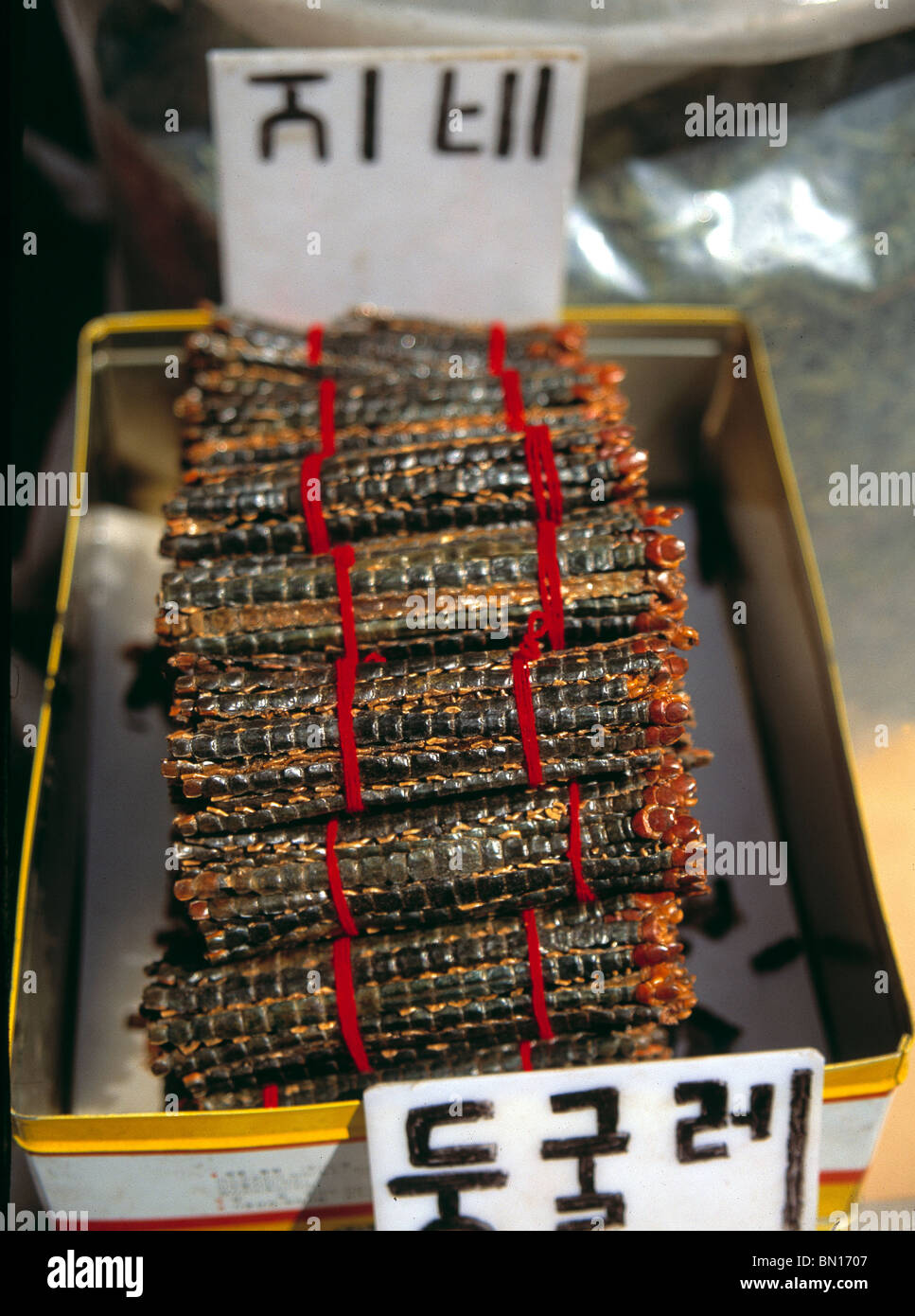 Centipedes for sale in a street market, Seoul, Korea Stock Photo - Alamy