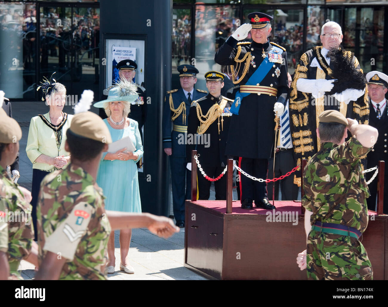 Britain's Prince Charles takes the salute at the Armed Forces Day ...