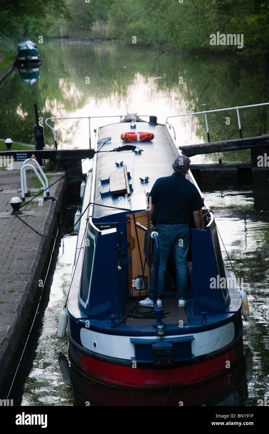Long boat at a canal lock, Grand Union Canal, Watford, Hertfordshire ...