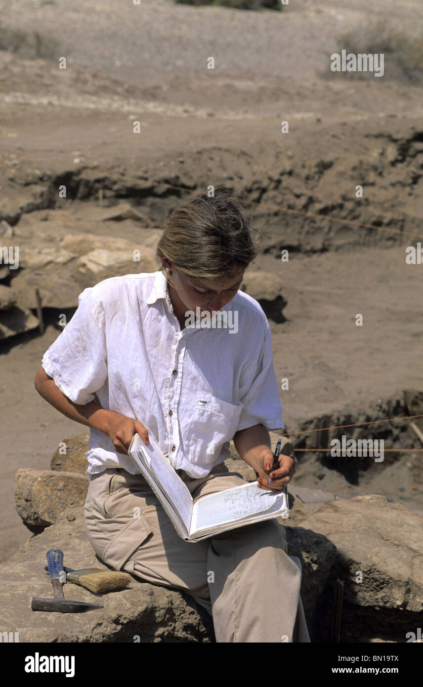Female archaeologist working on a dig Yemen Stock Photo - Alamy