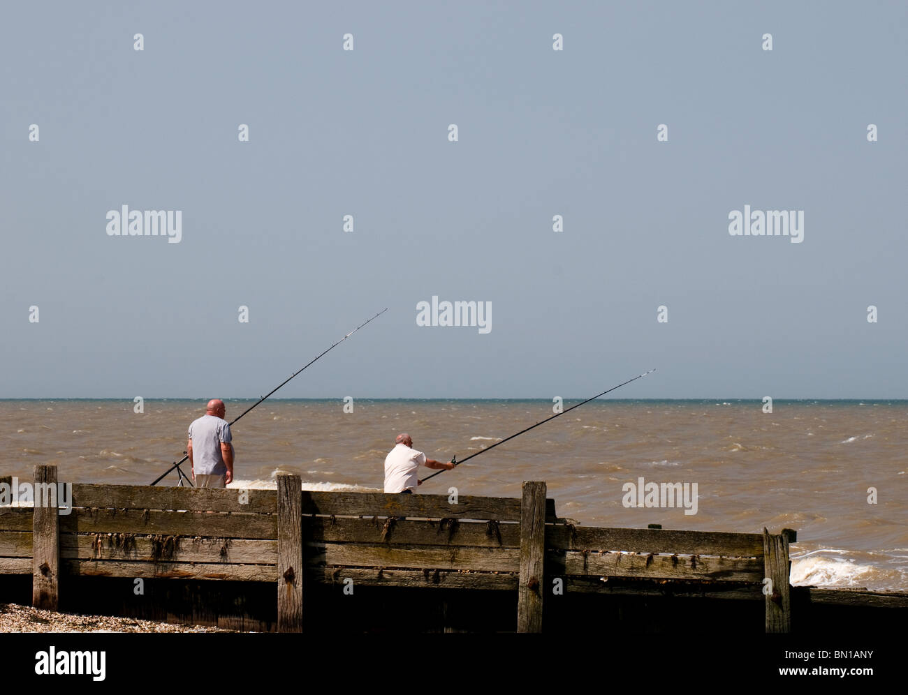 Anglers on Leysdown Beach on the Isle of Sheppey in Kent. Photo by ...
