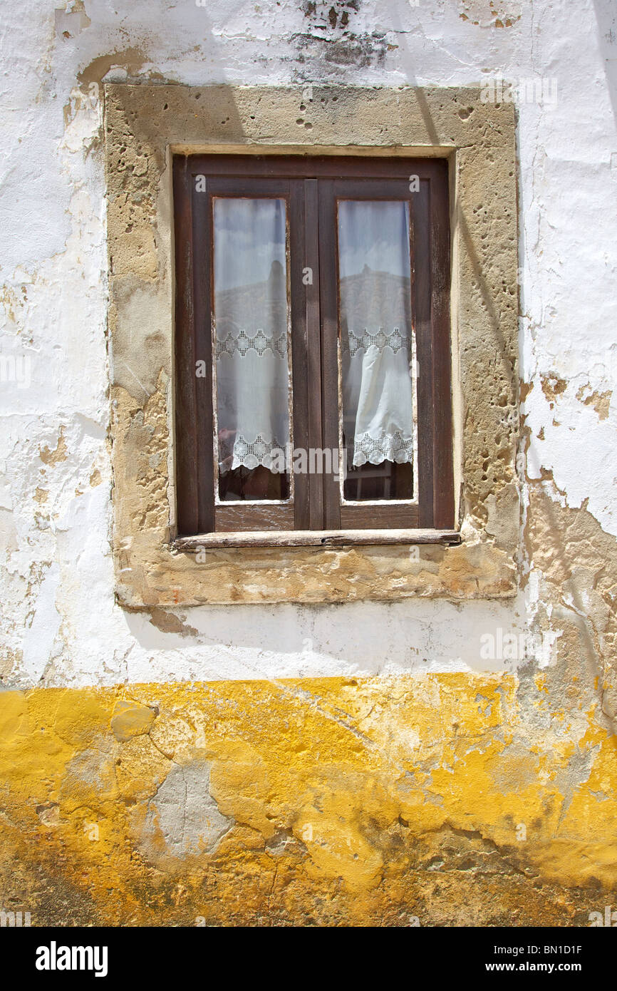 Rustic Brown Wood Window against a Yellow Wall Stock Photo - Alamy