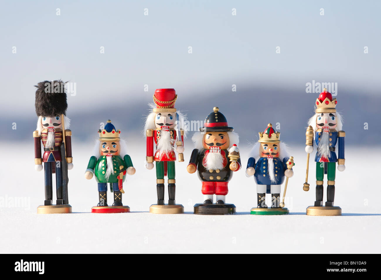 A Group of Nutcrackers stands on the snow Stock Photo - Alamy