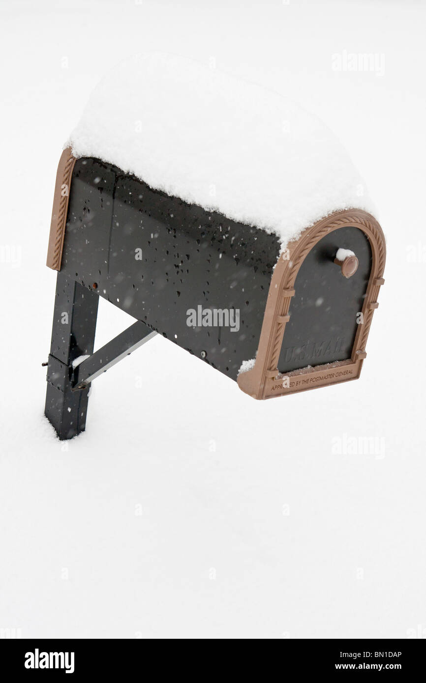 A mailbox covered in snow Stock Photo - Alamy