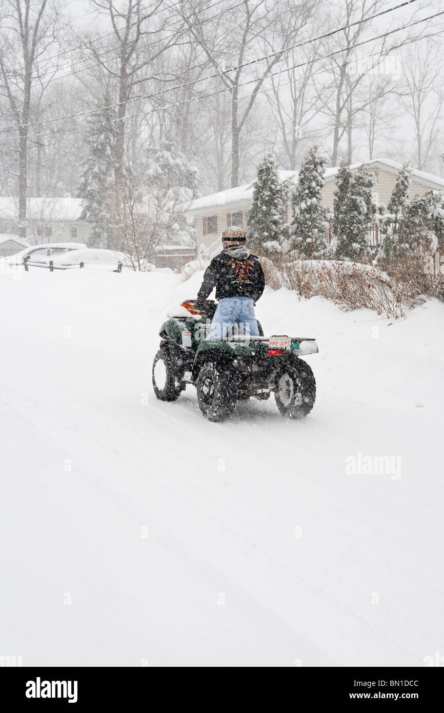 Atv covered in snow hi-res stock photography and images - Alamy