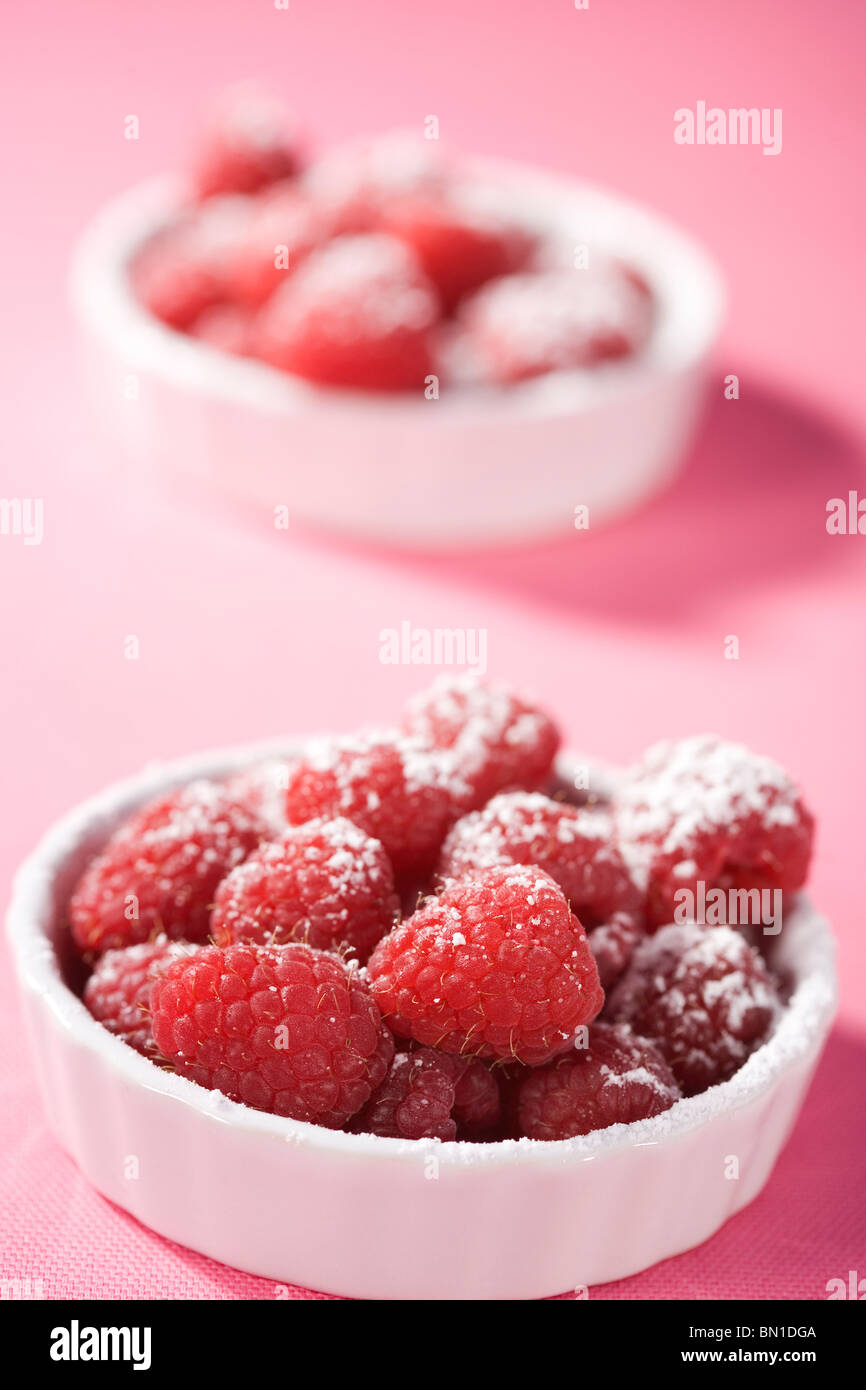 Fresh Red Raspberries with Powdered Sugar Topping Stock Photo - Alamy