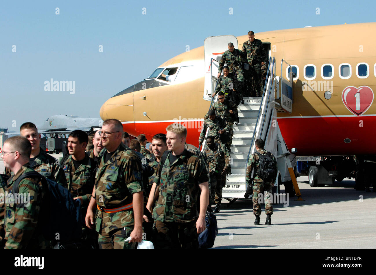 Airmen from the 7th Bomb Wing at Dyess Air Force Base, Texas, exit an ...