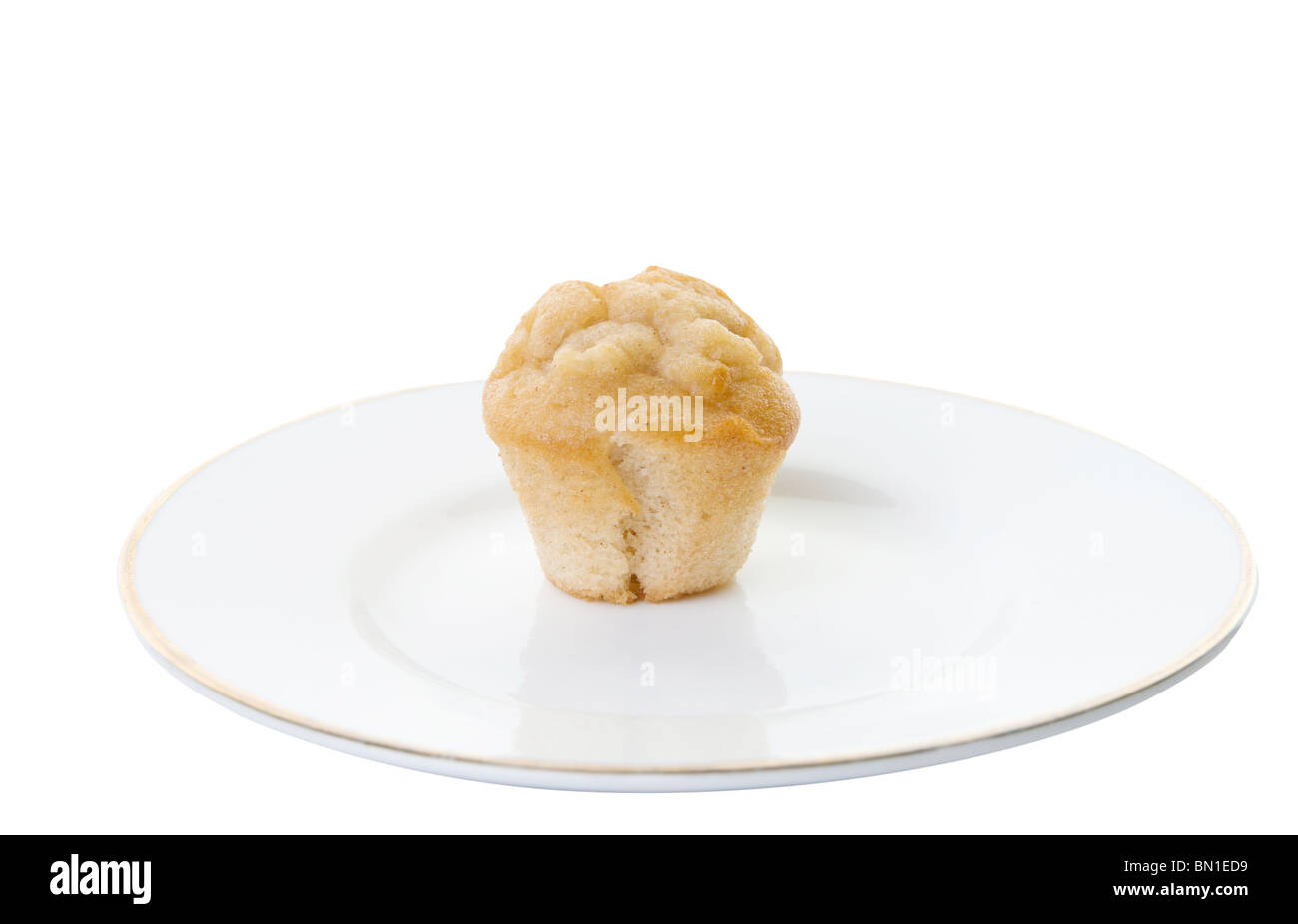 one single mini muffin cake on a plate isolated on white Stock Photo ...