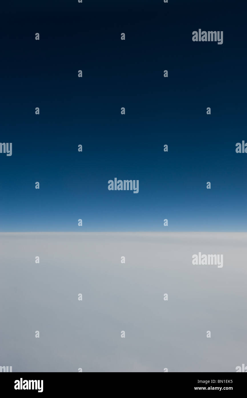 Unusual view through the window of a commercial jet showing cloud ...