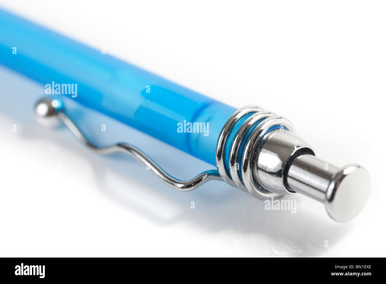 A closeup of a blue pen, focus on one end, isolated on white Stock ...