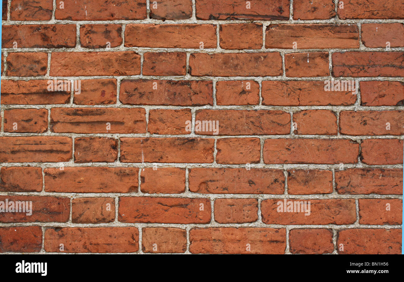Red Brick wall with thin lime mortar joints. Suffolk red bricks Stock ...
