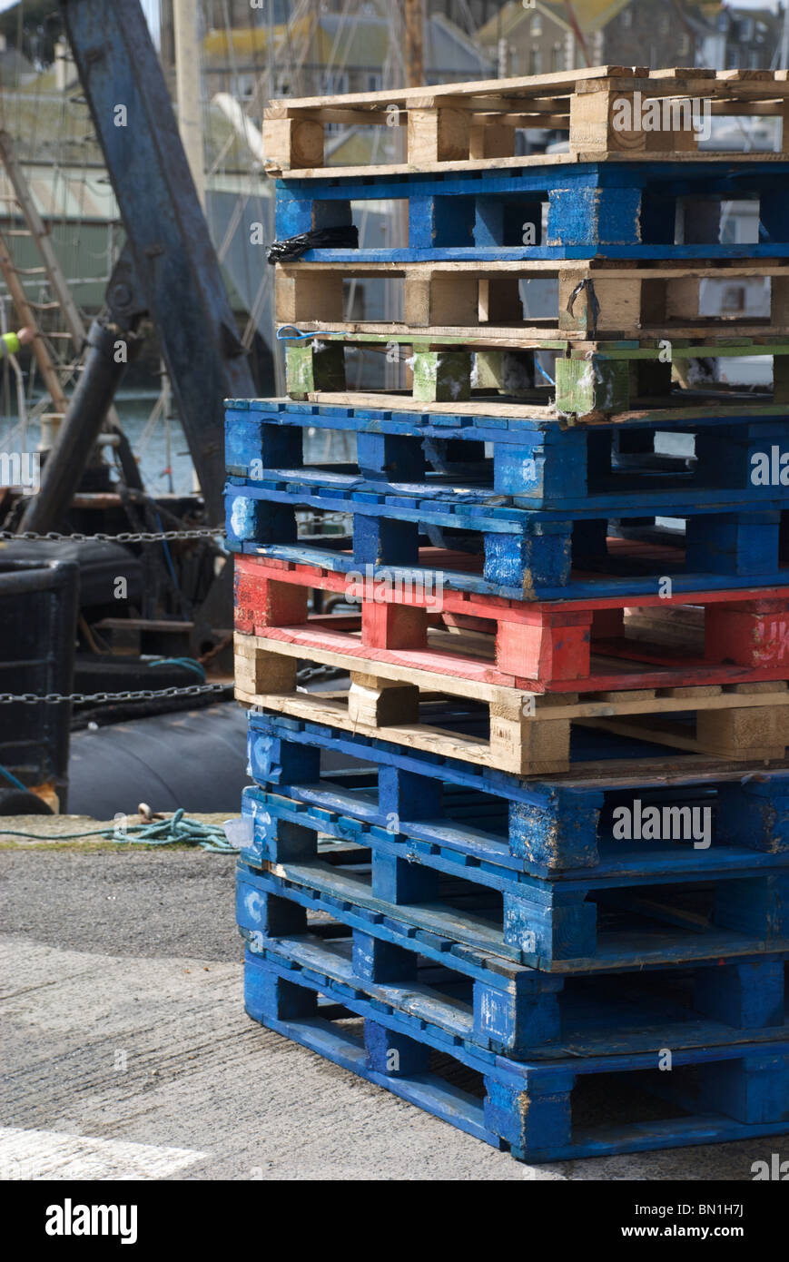 Stack of blue wooden pallets hi-res stock photography and images - Alamy