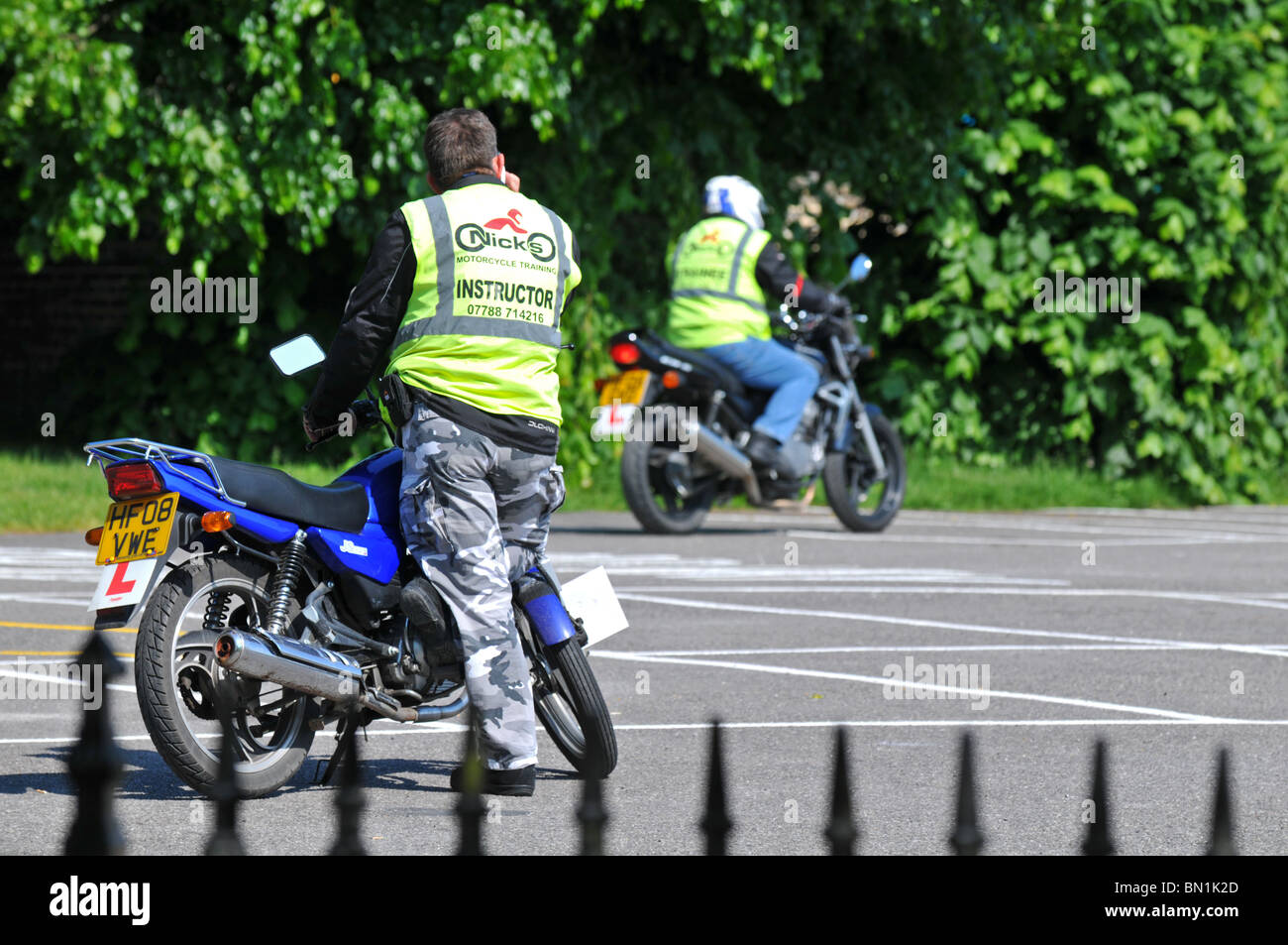 Motorcycle lesson, motorcycle instructor with a learner rider, UK Stock ...