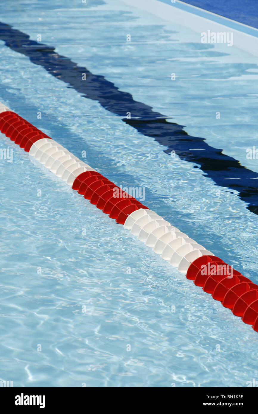 empty olympic type swimming pool with lanes Stock Photo - Alamy