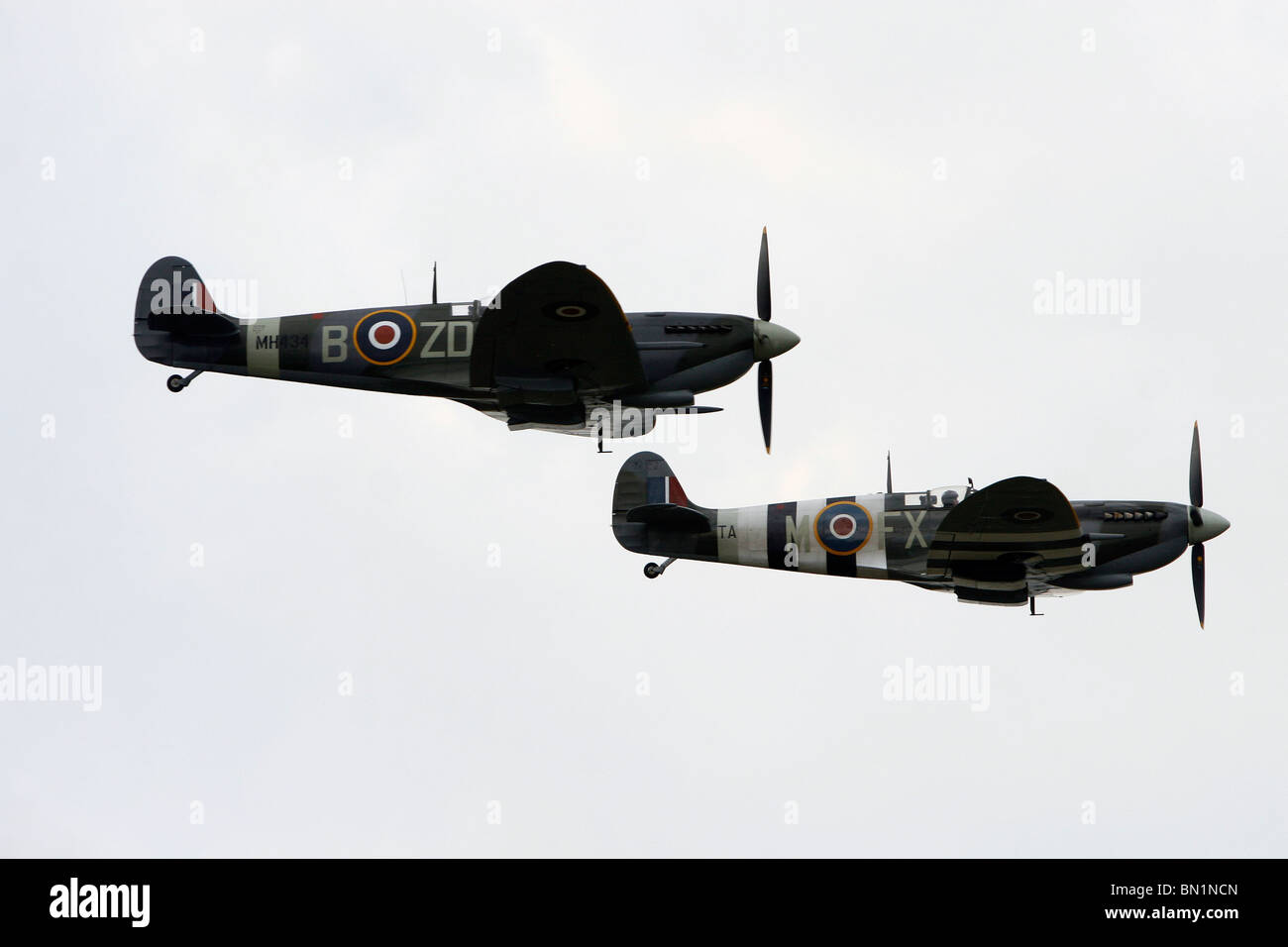 A pair of Second world war Spitfires fly over Kent in England Stock ...