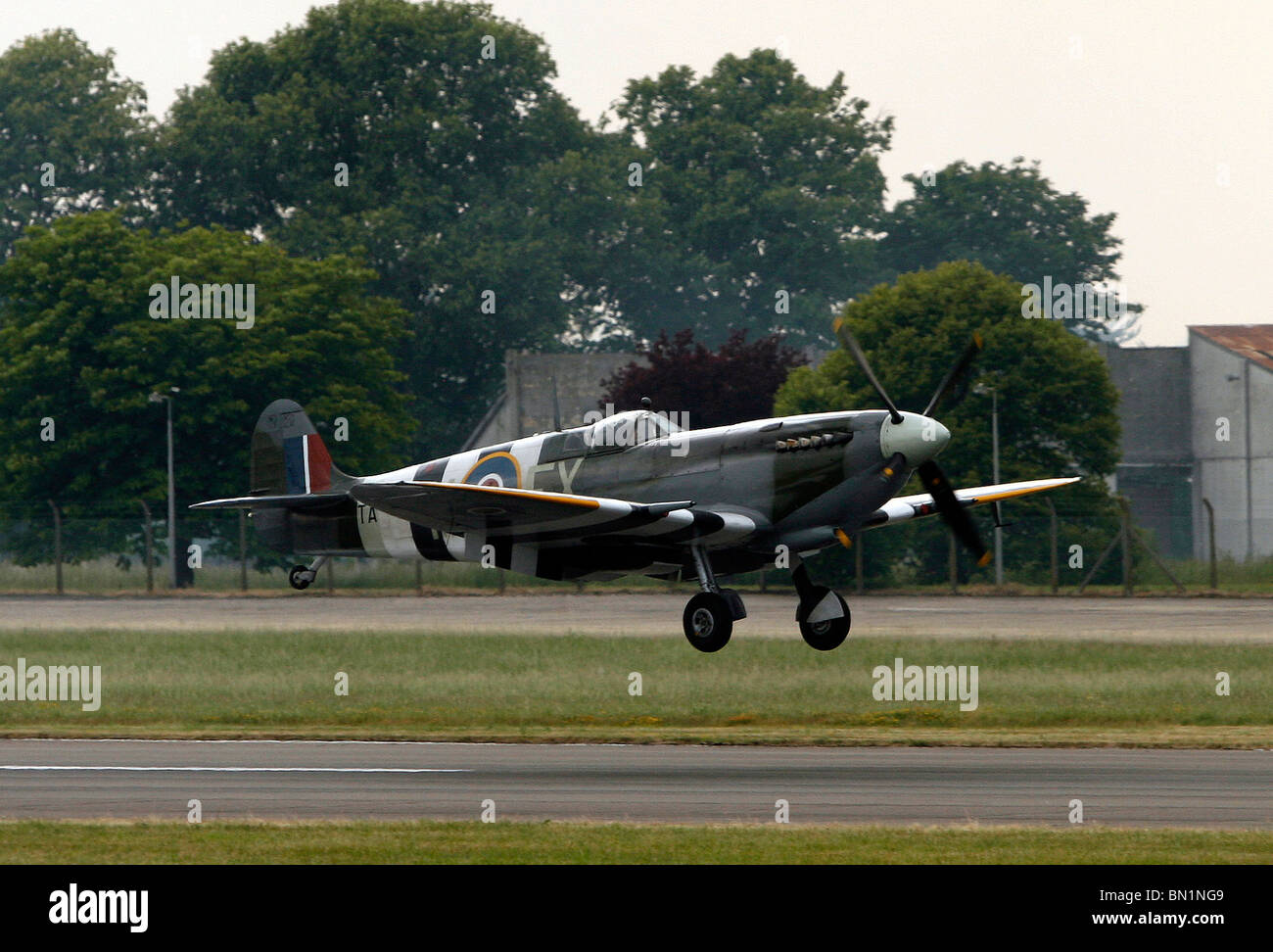 A Second world war Spitfire comes in to land at Biggin Hill Airport ...