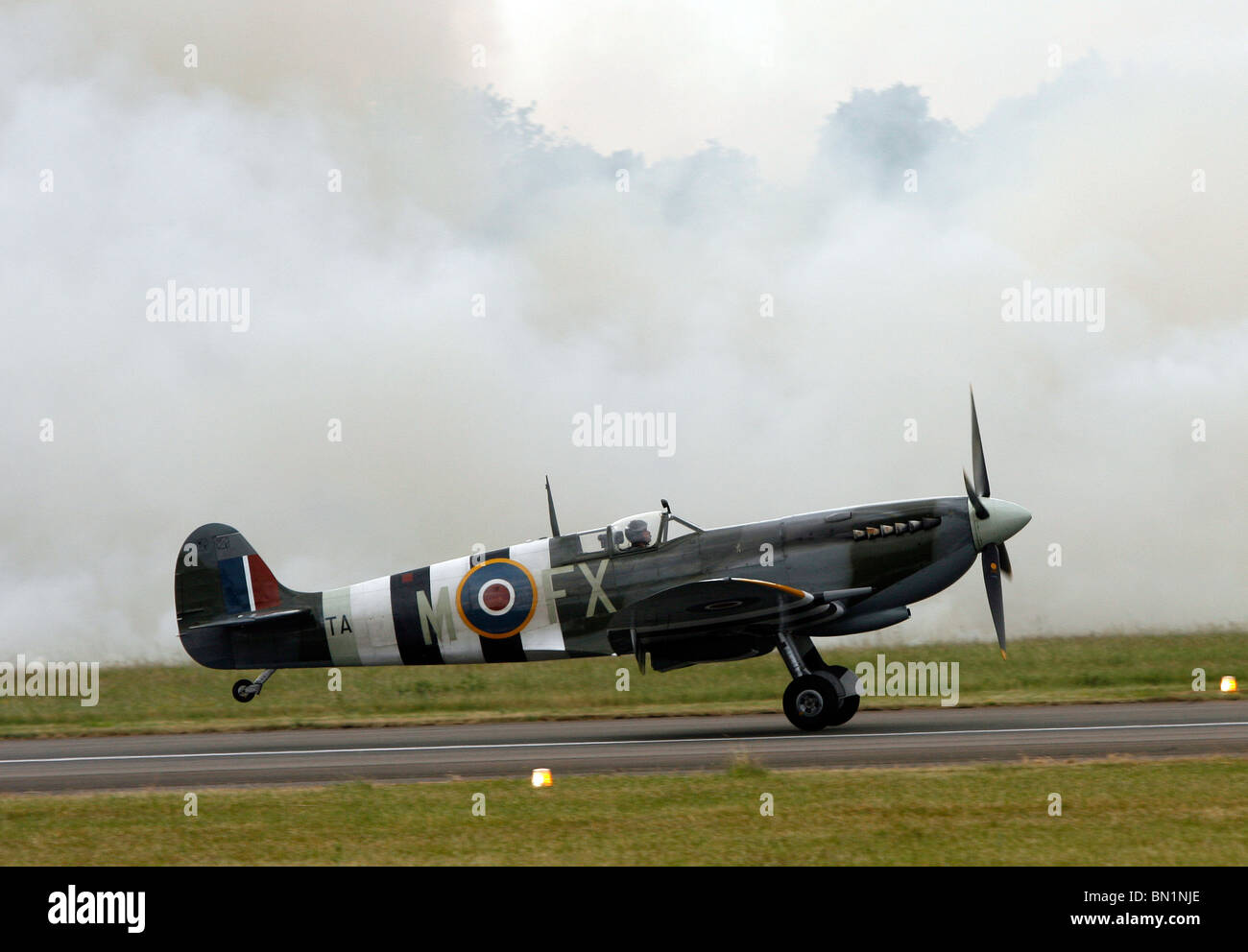 A Second world war Spitfire comes in to land at Biggin Hill Airport ...