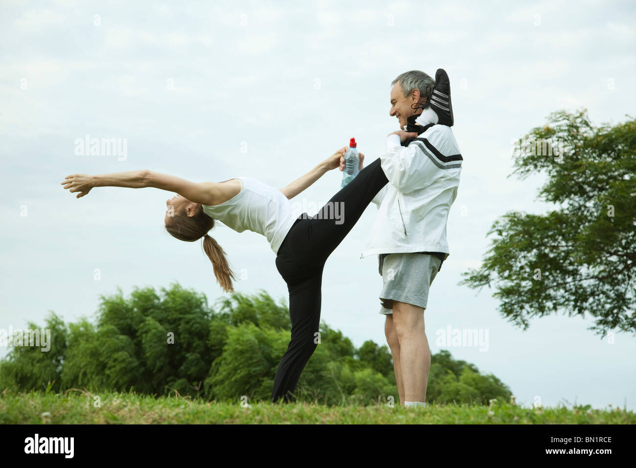 Bending over backward hi-res stock photography and images - Alamy