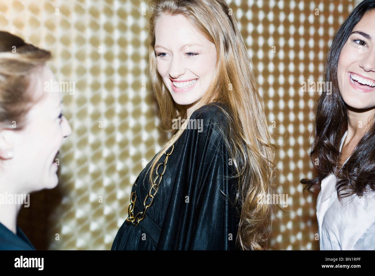 Friends having fun together at night club Stock Photo - Alamy