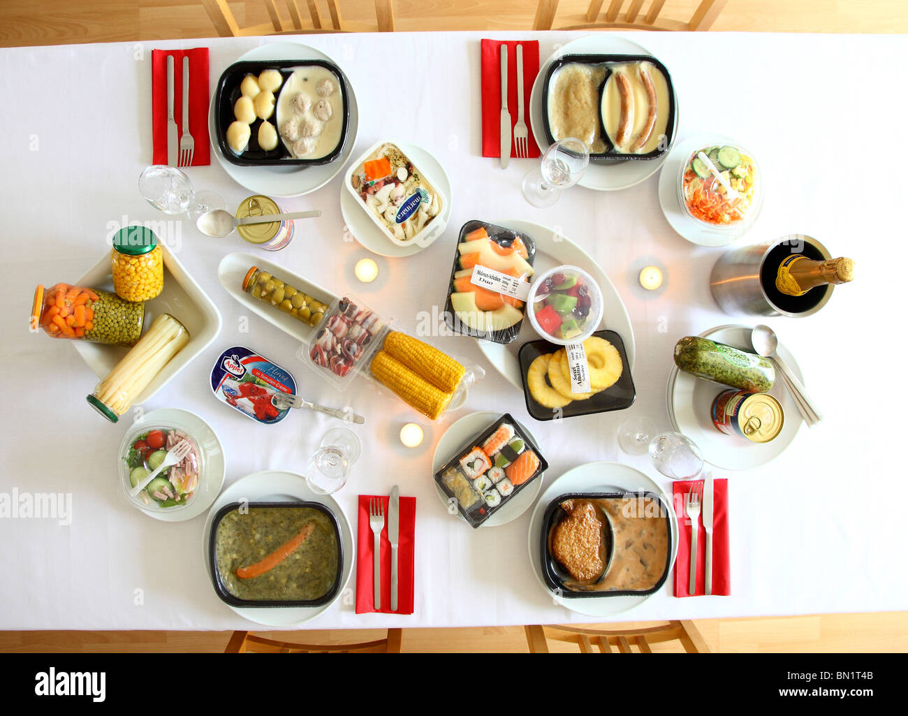 Table, decorated with different convenience food products, all ready-to ...