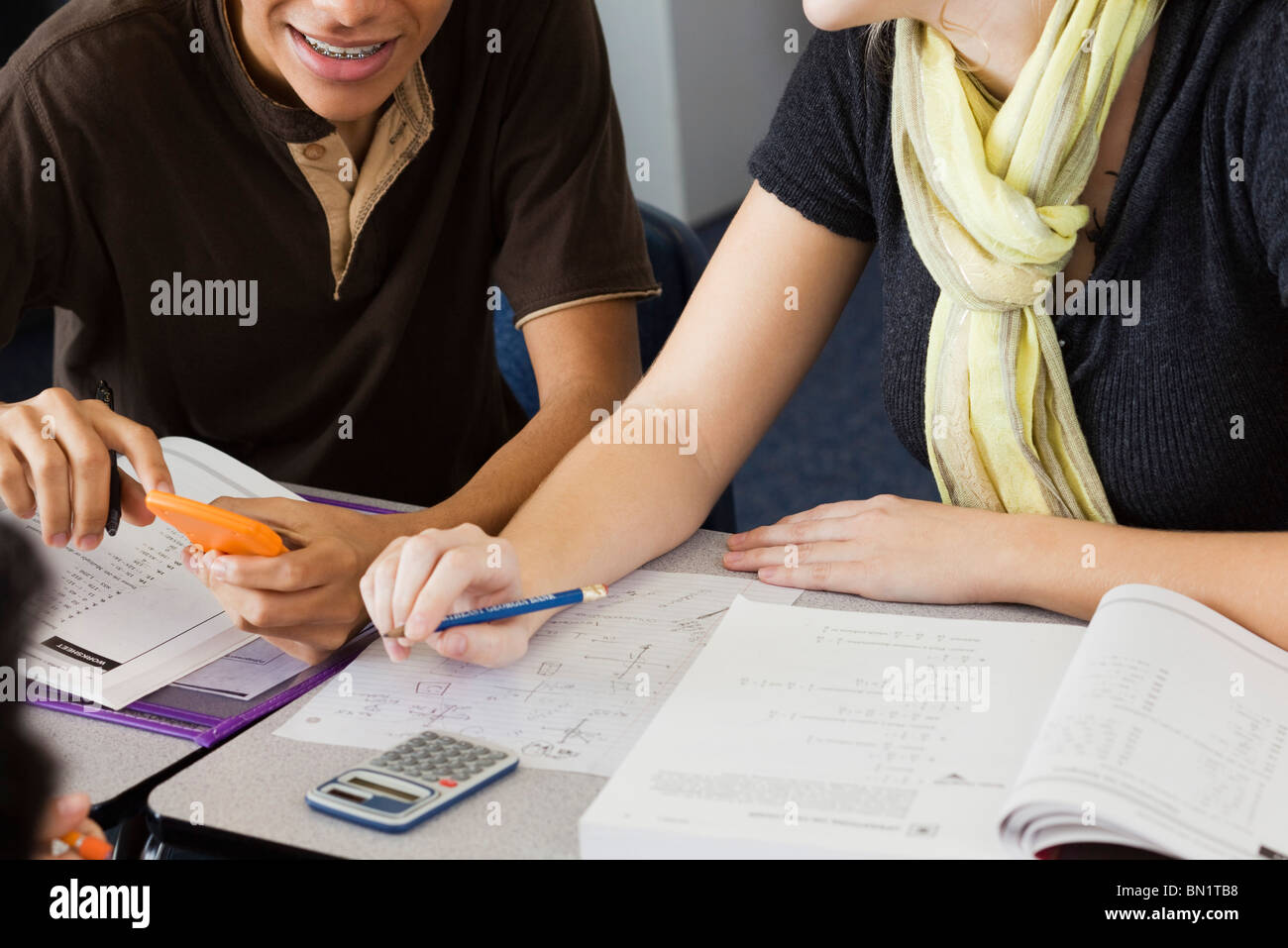 Classmates studying mathematics together Stock Photo - Alamy