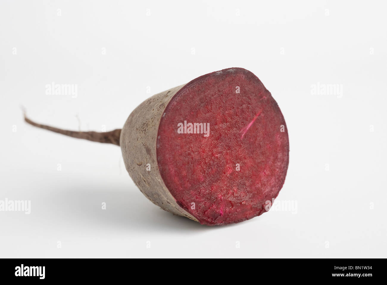 Beet, cut in half Stock Photo - Alamy