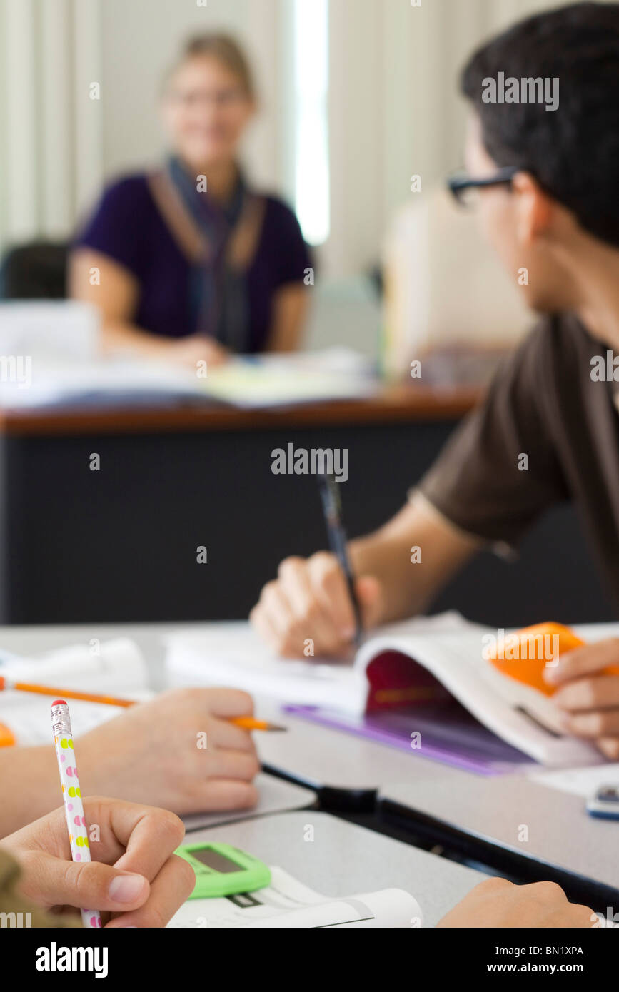 Students completing assignment in math class Stock Photo - Alamy