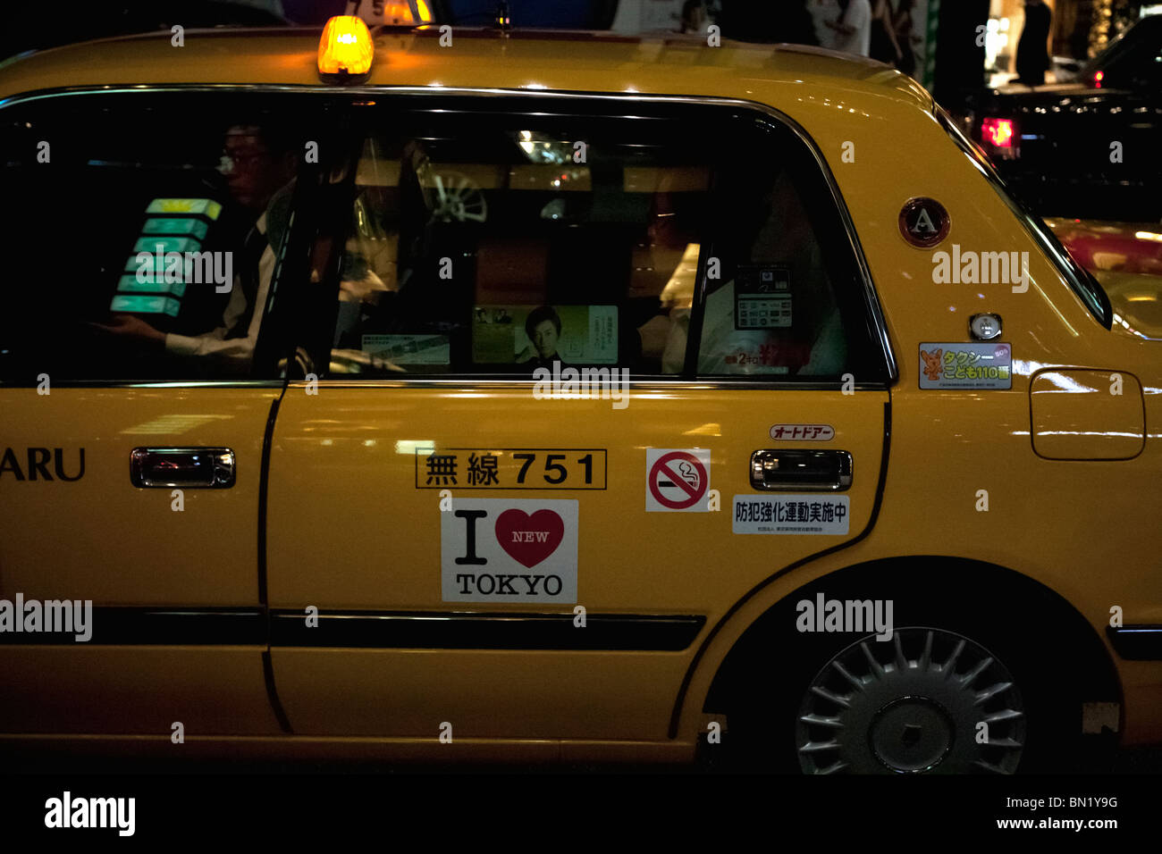 Yellow cab in Ginza, Tokyo Japan Stock Photo - Alamy
