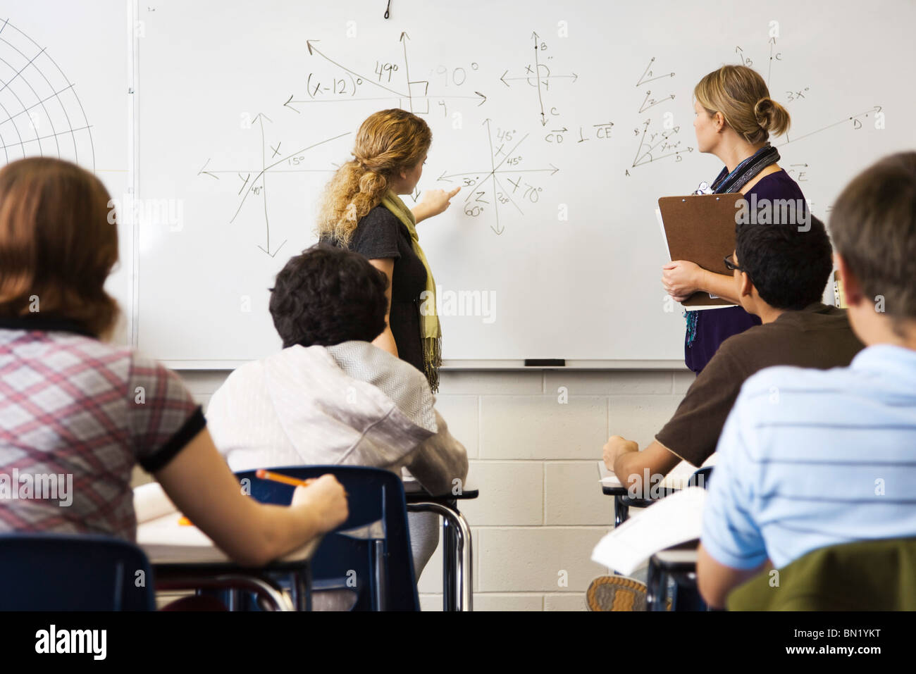Maths teacher hi-res stock photography and images - Alamy
