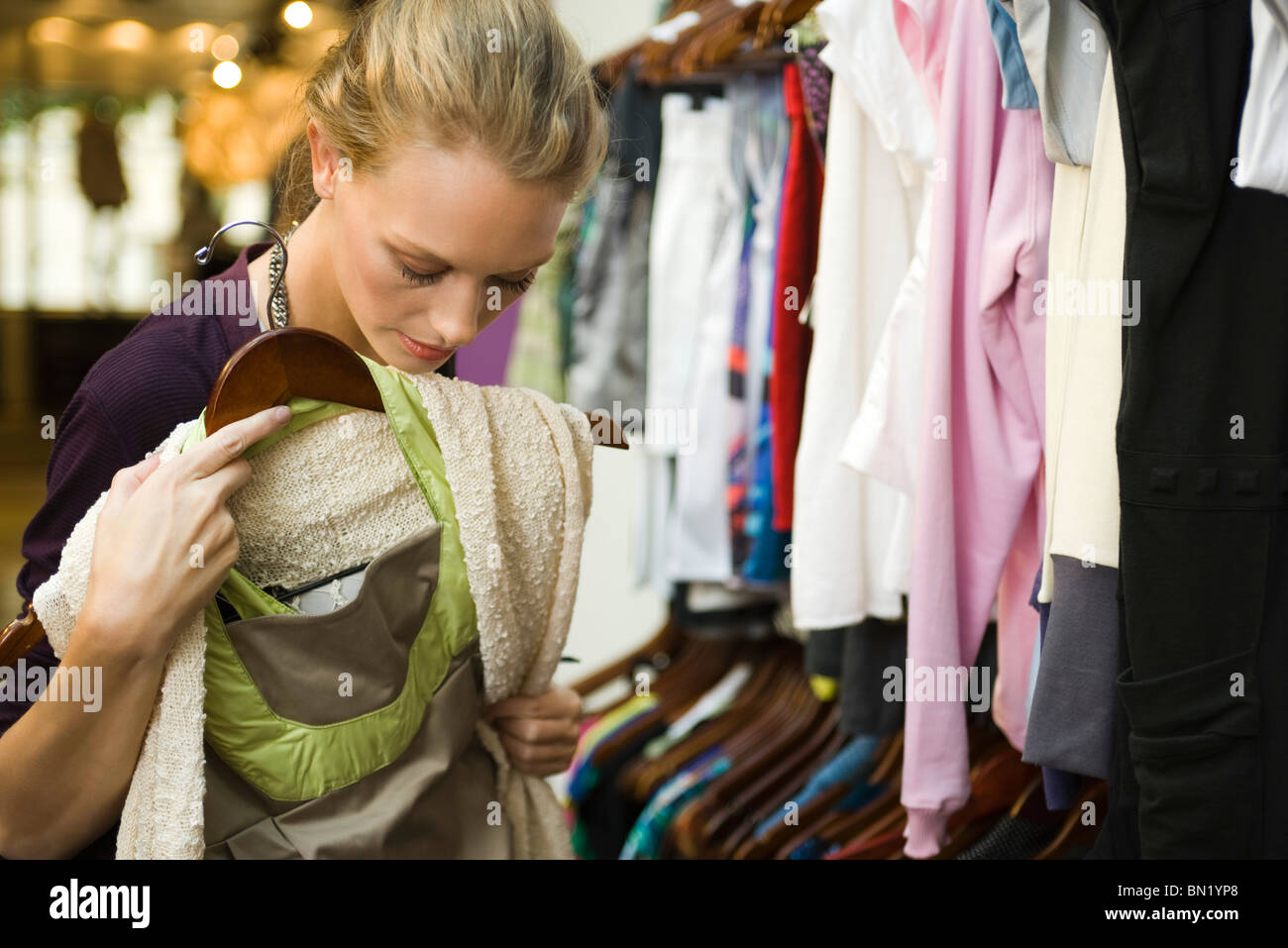Shopping in clothing store Stock Photo - Alamy