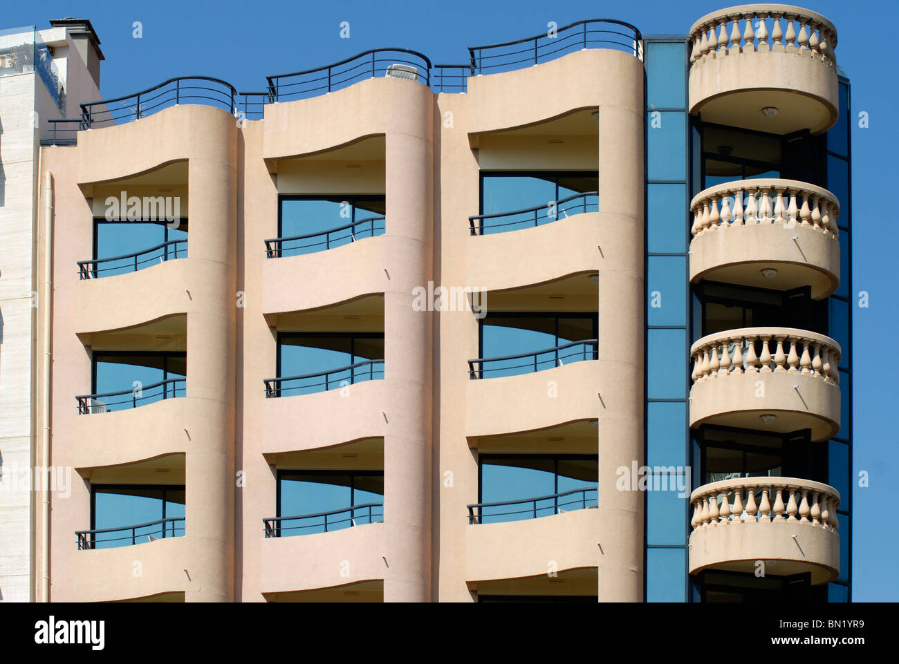 Modern hotel building of concrete and glass. Seafront at Cannes. Cote d ...