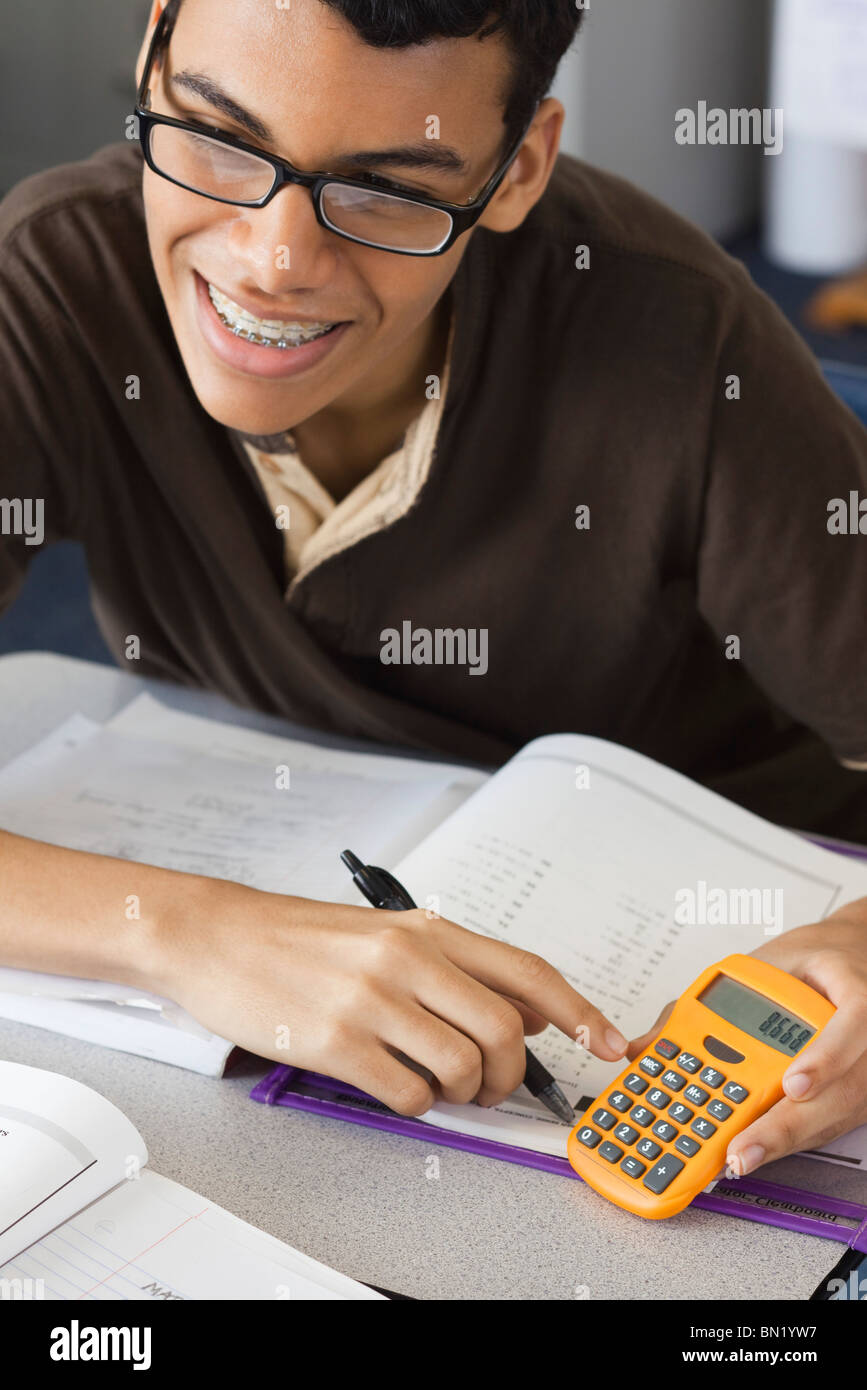 High school student using calculator Stock Photo - Alamy