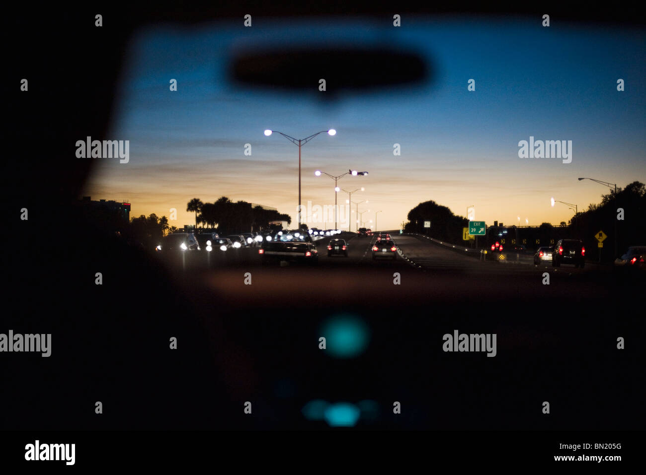 Driving at dusk Stock Photo - Alamy