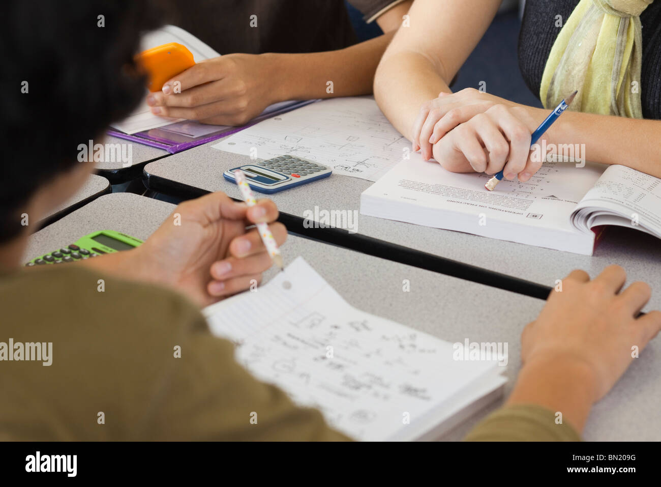 Students studying mathematics, cropped Stock Photo - Alamy