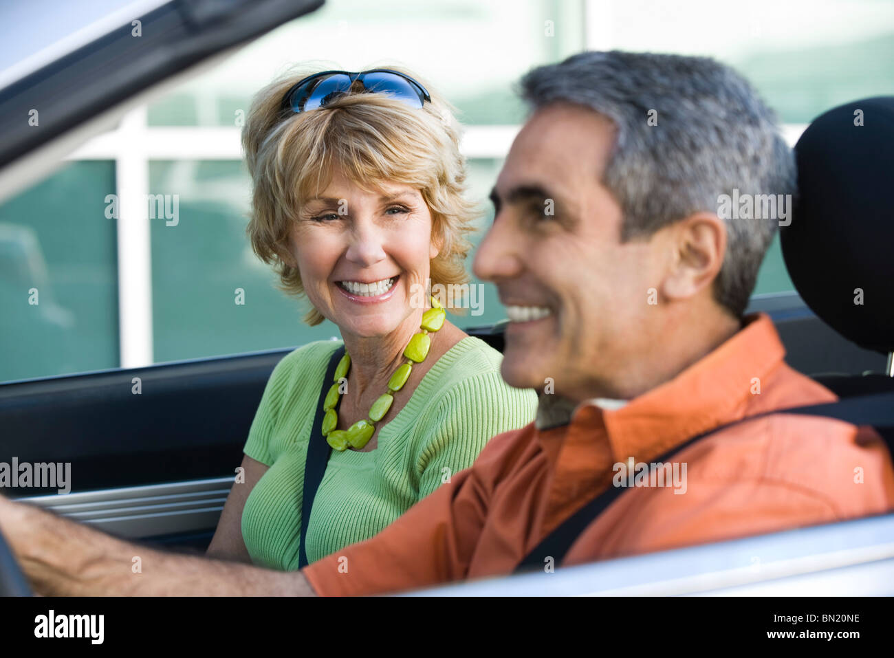 Mature couple out for pleasure drive Stock Photo - Alamy