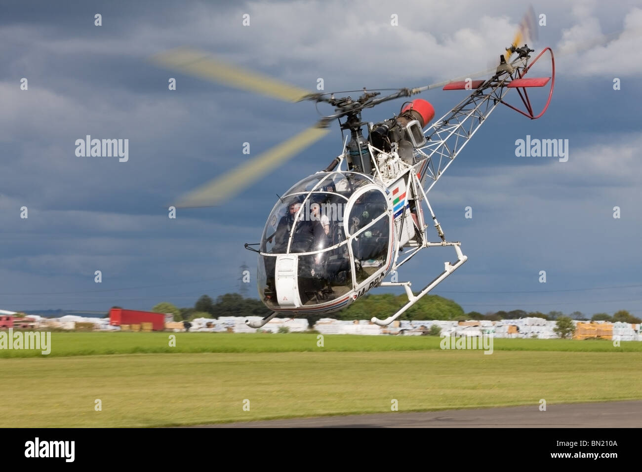 Aerospatiale SE131B Alouette HA-PPC in flight along runway at Breighton ...